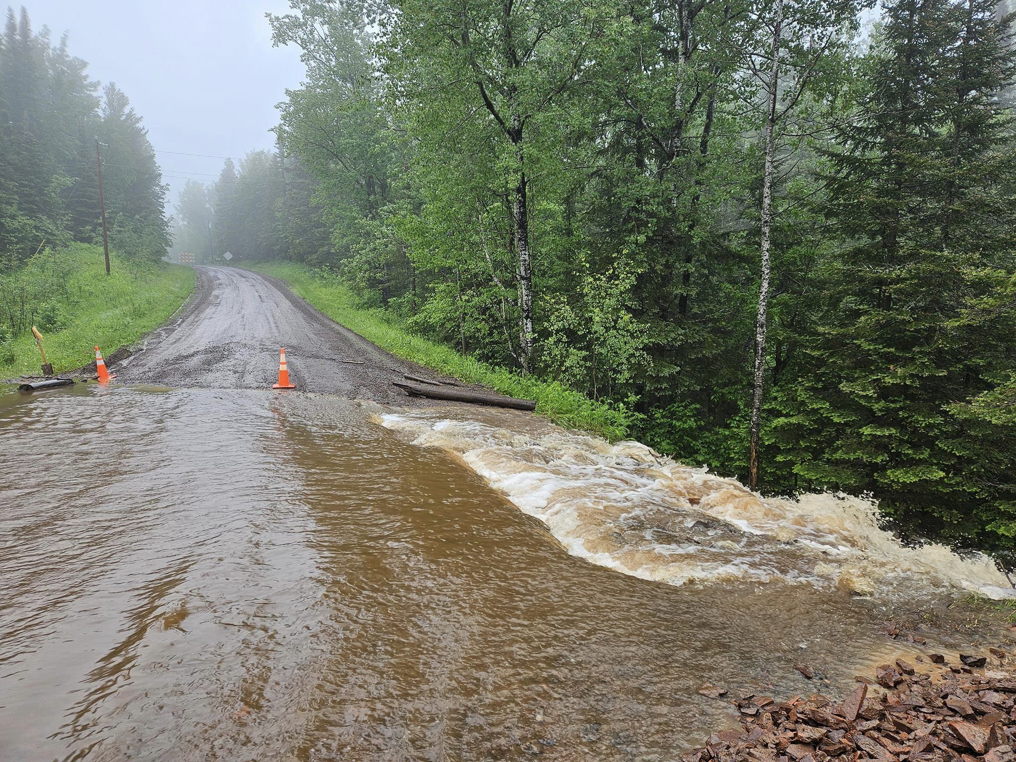 Highway Department monitoring flooding and washout at Caspers Hill Rd ...